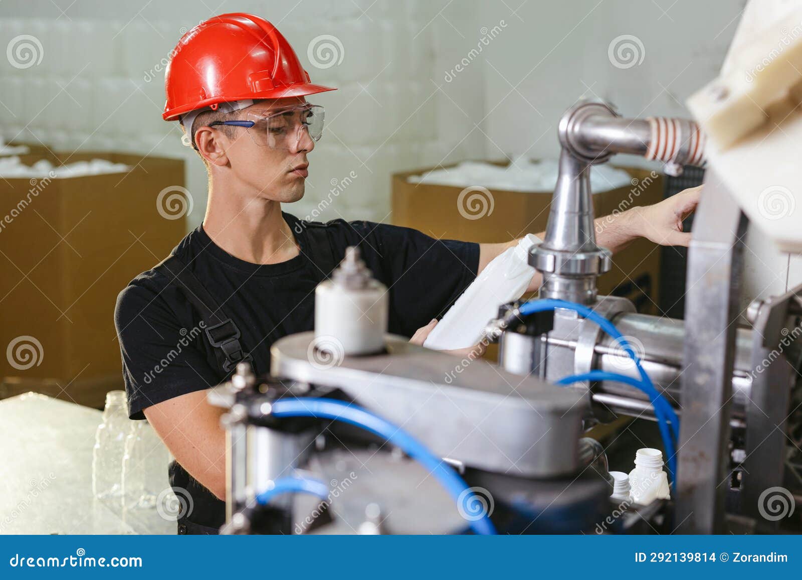 Production Line Worker or Technologist in Uniform Working in Chemical ...