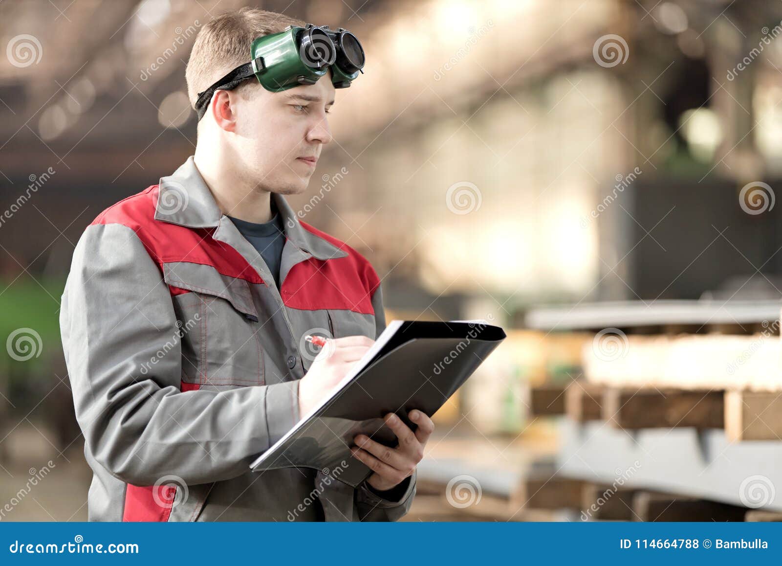 Production Man Worker on Manufacture Workshop Background Stock Photo ...