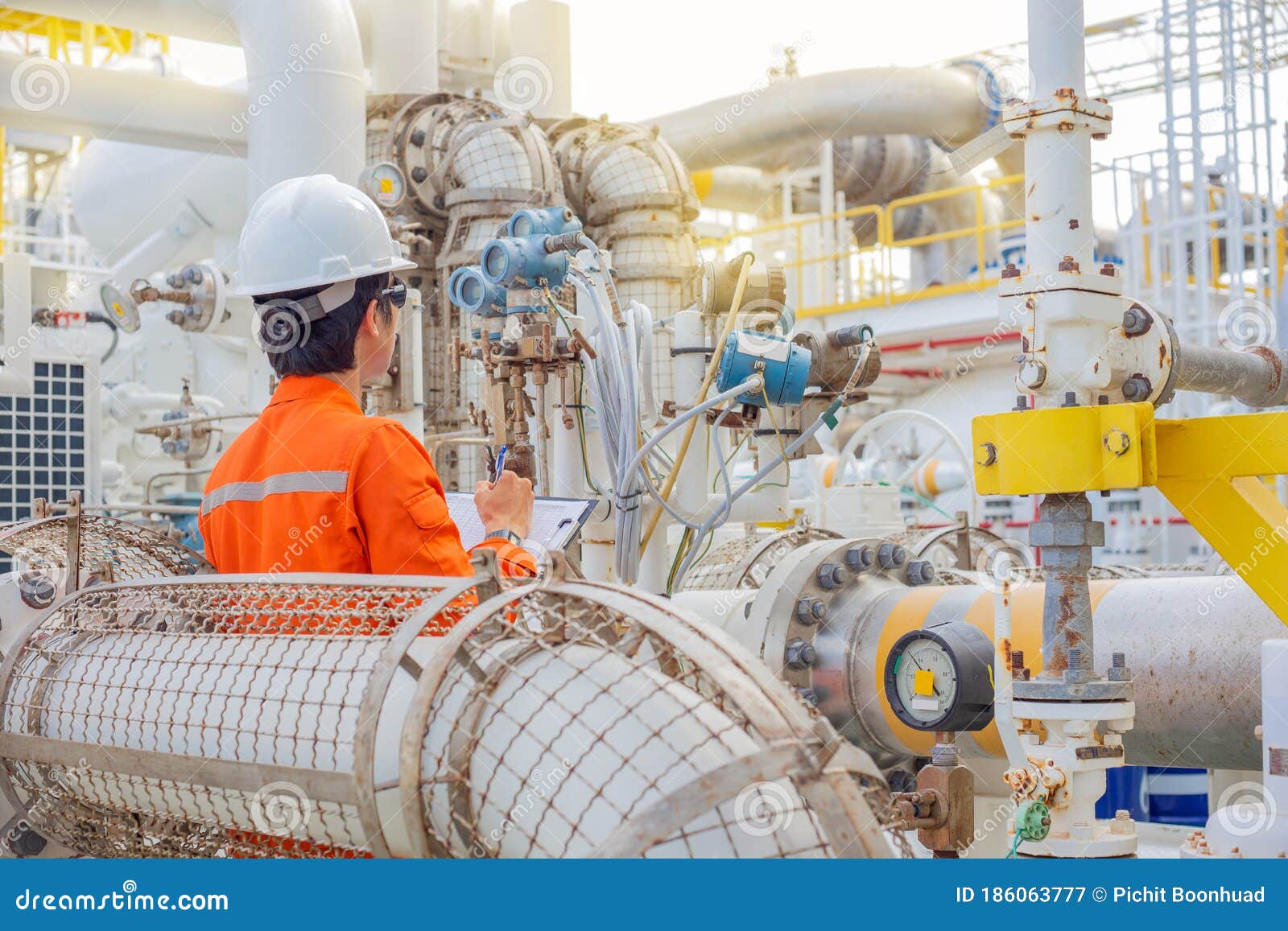 Production Operator Checking Reading Value of Gas Compressor and Record ...