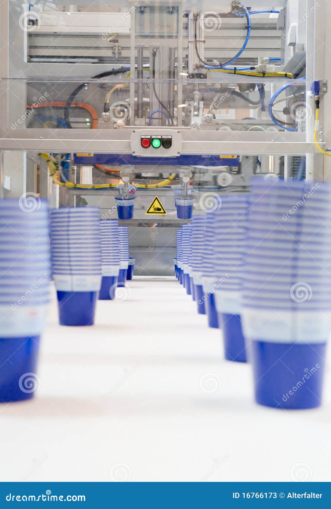 Production of plastic cups stock image. Image of production - 16766173
