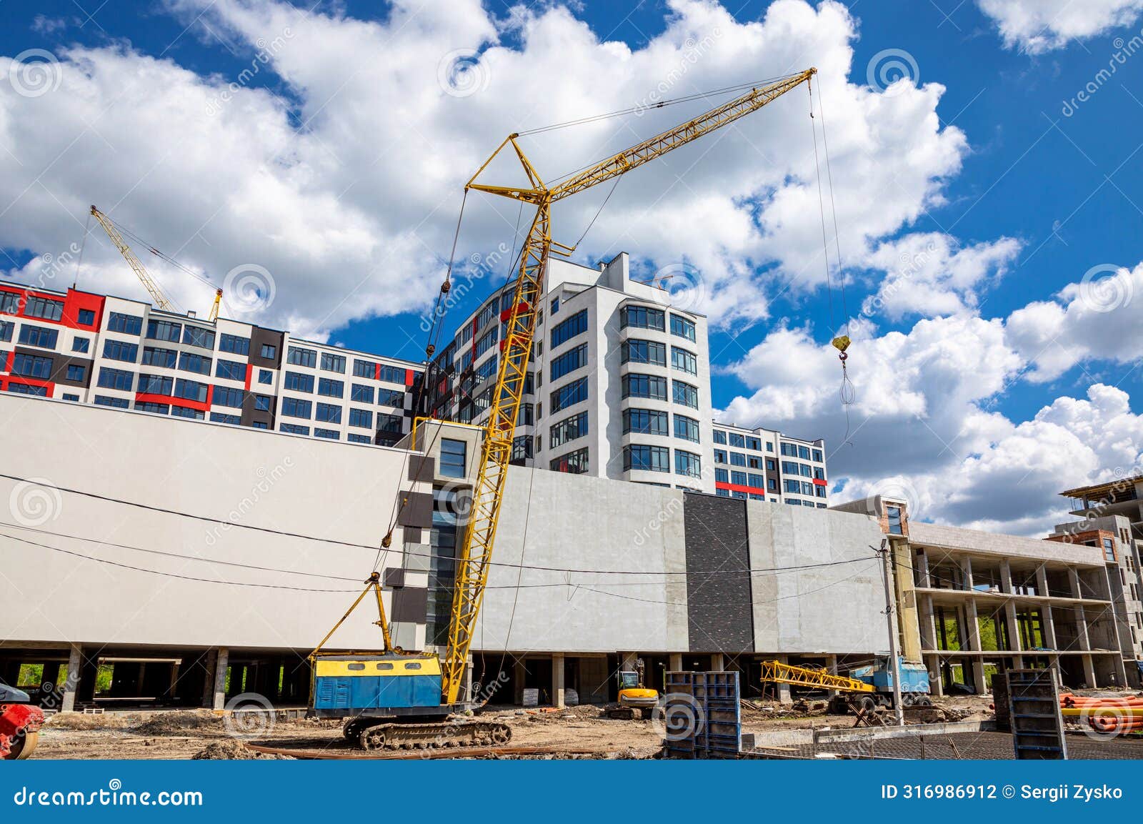 Production Process in the Construction of a New House. Lifting Crane at ...