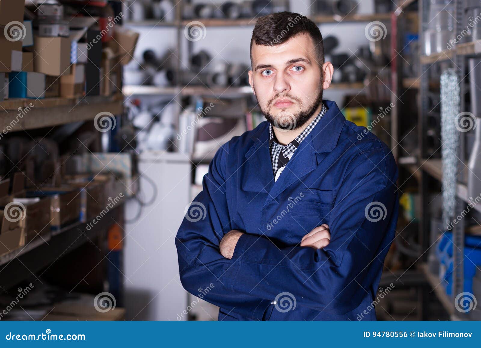 Production Worker in Uniform Displaying His Workplace Stock Photo ...