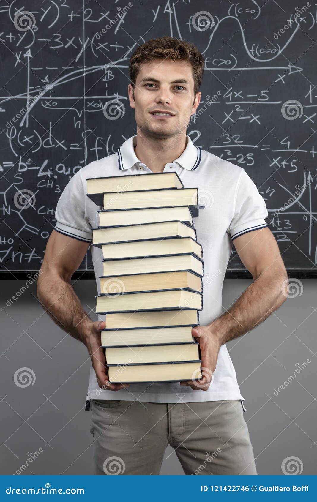 Profesor con los libros foto de archivo. Imagen de trabajador - 121422746