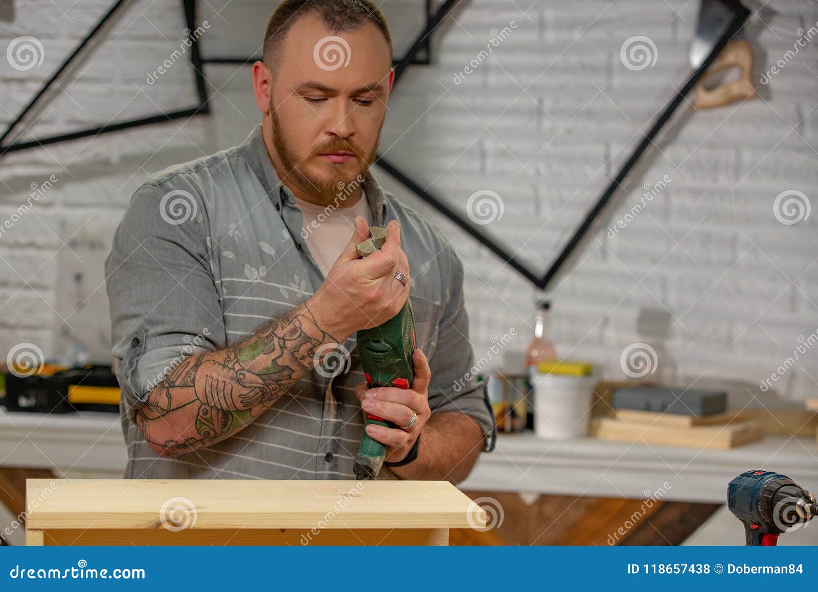 Profession, Carpentry, Woodwork and People Concept - Carpenter Adjusts ...