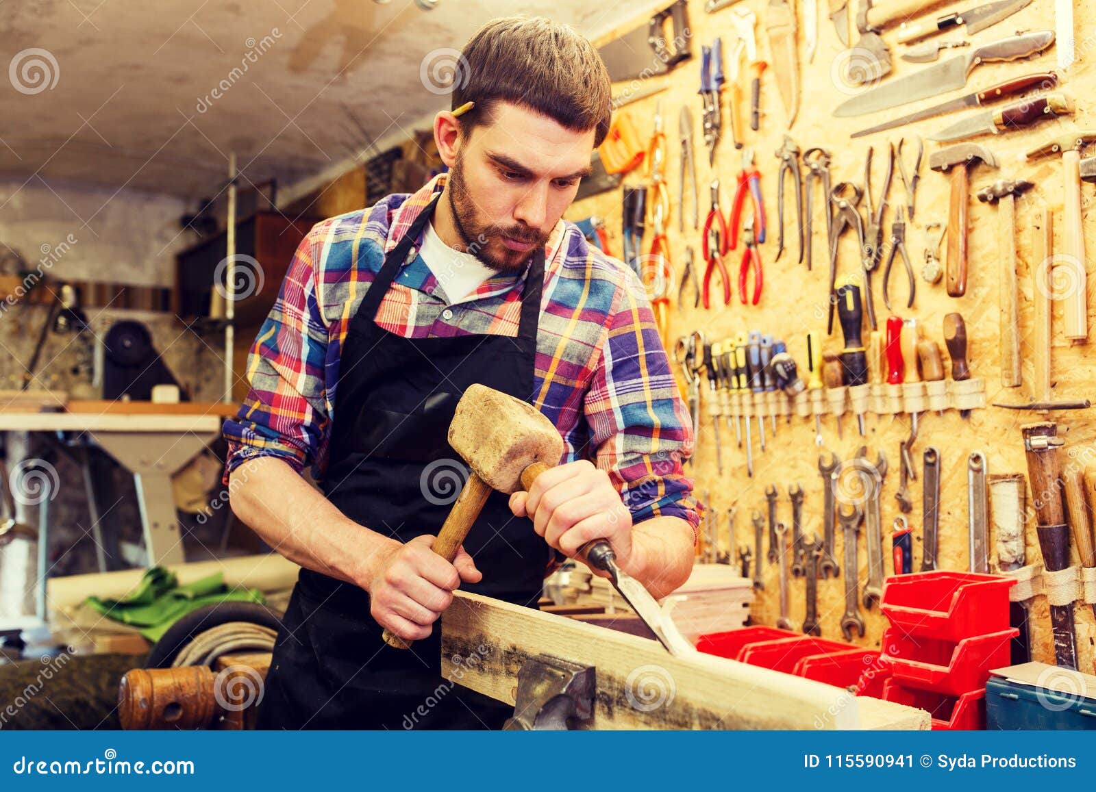 Carpenter with Wood, Hammer and Chisel at Workshop Stock Image - Image ...