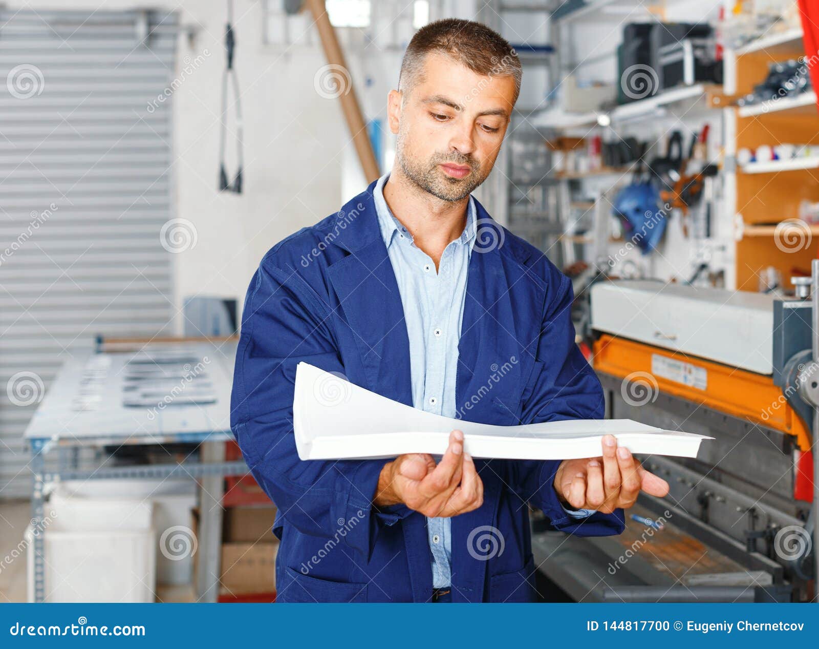 Profession,job,people,workman in Special Clothes with Paper Stock Photo ...