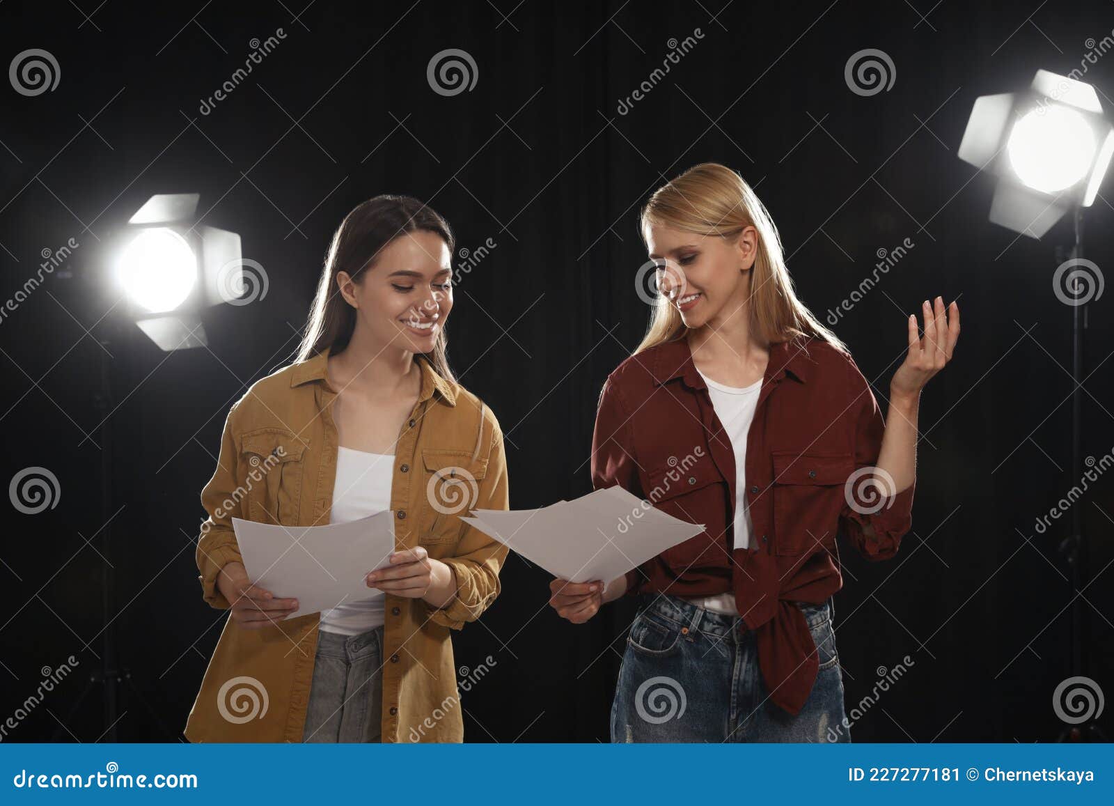 Professional Actresses Reading Scripts during Rehearsal in Theatre ...