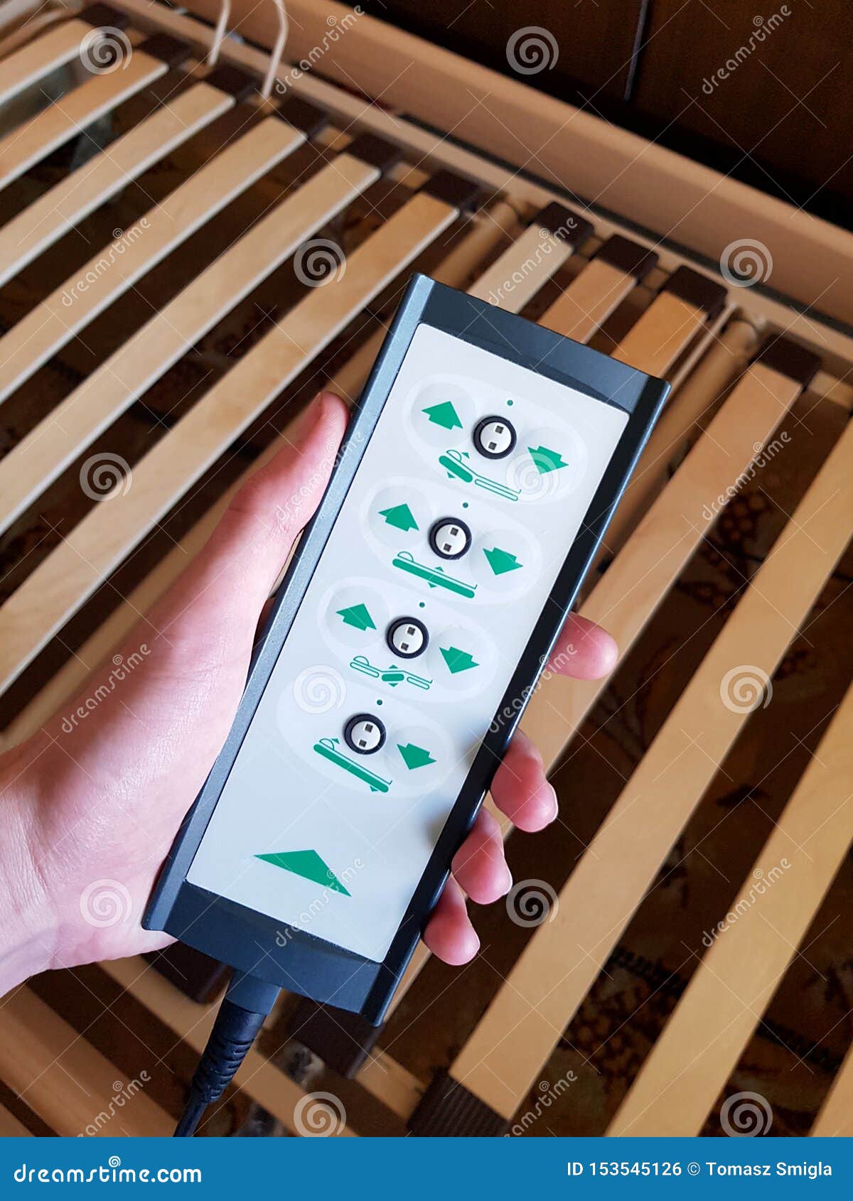 Professional Adjustable Bed Remote Control Held in Hand, Bed in the ...