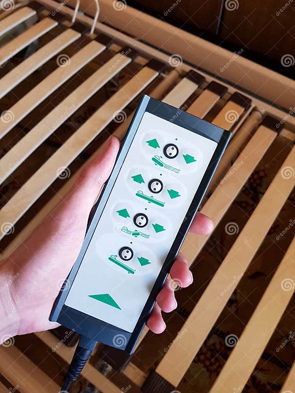Professional Adjustable Bed Remote Control Held in Hand, Bed in the ...