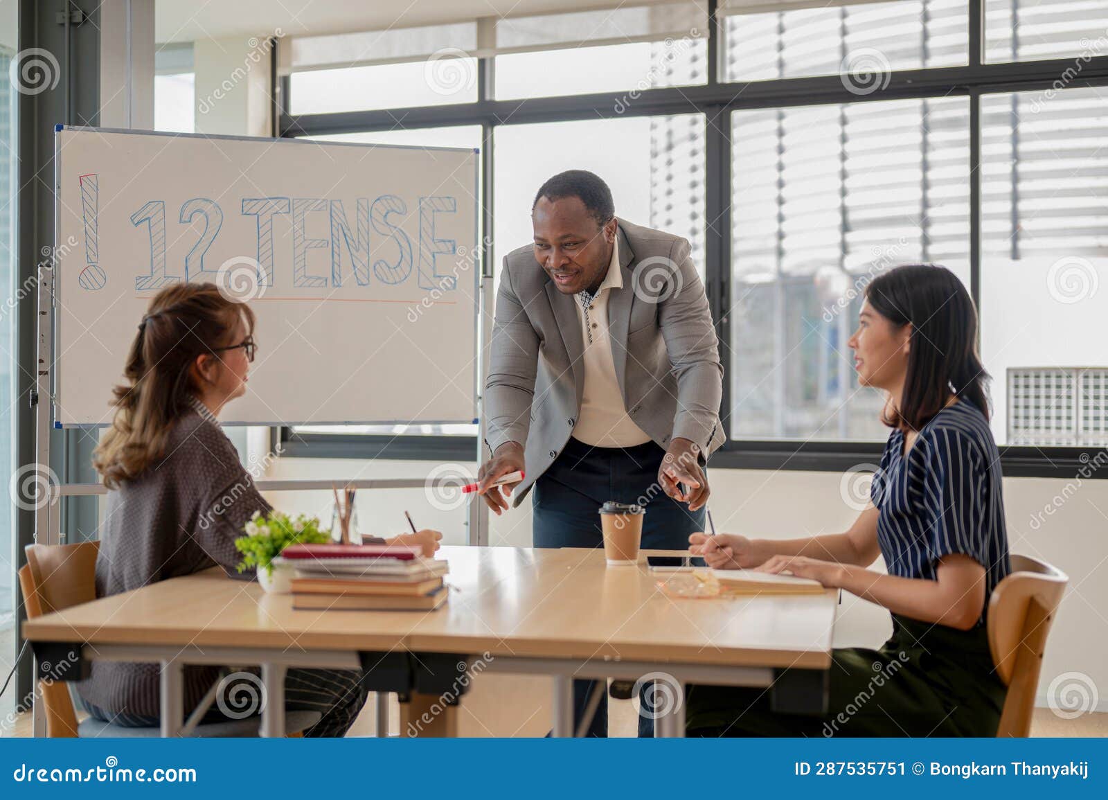 A Professional African American Male English Tutor is Discussing ...