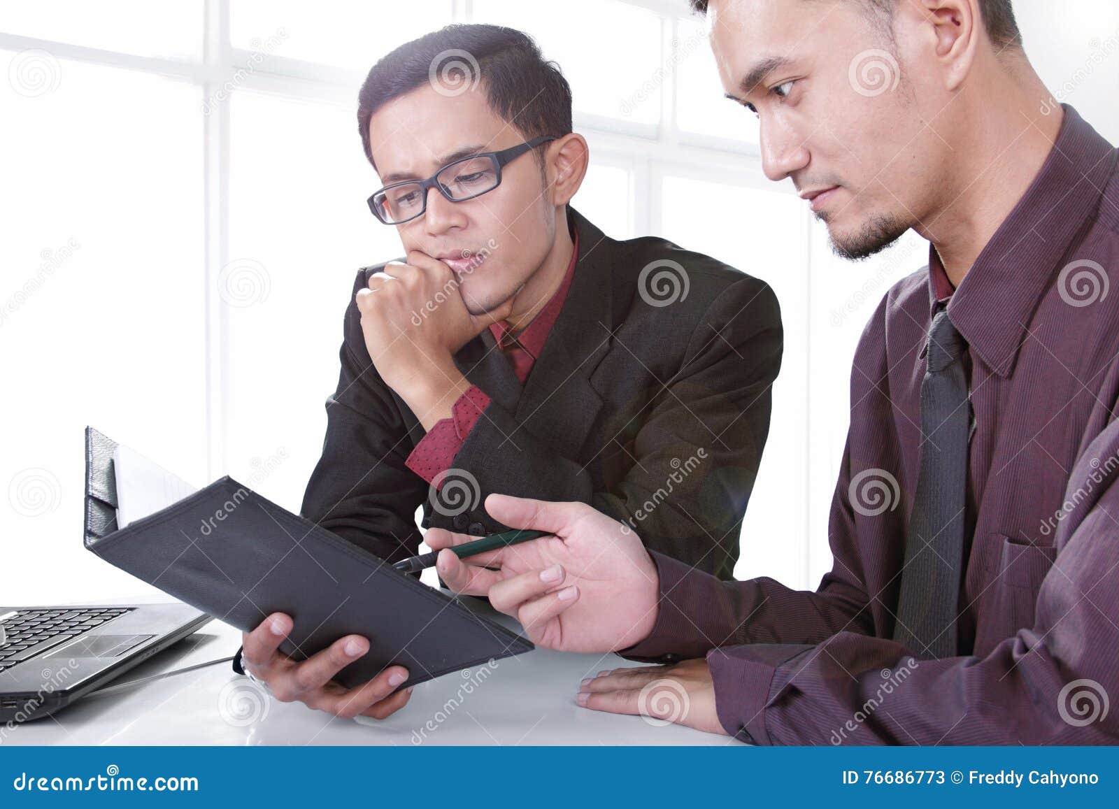 Professional Analysts Discussing a Business Report Stock Image - Image ...