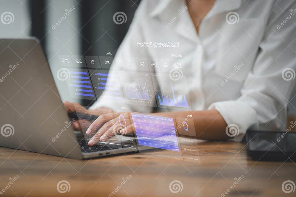 Professional Analyzing Complex Data with a Futuristic Holographic Display Interface Over a ...