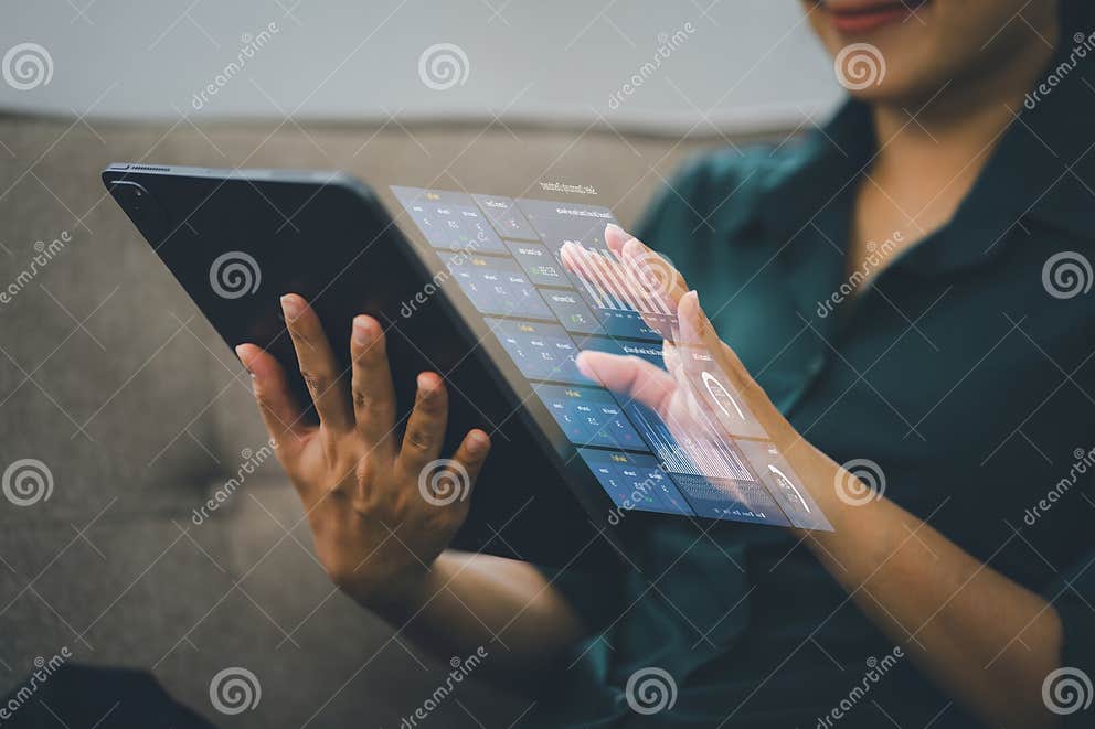 Professional Analyzing Complex Data with a Futuristic Holographic Display Interface Over a ...