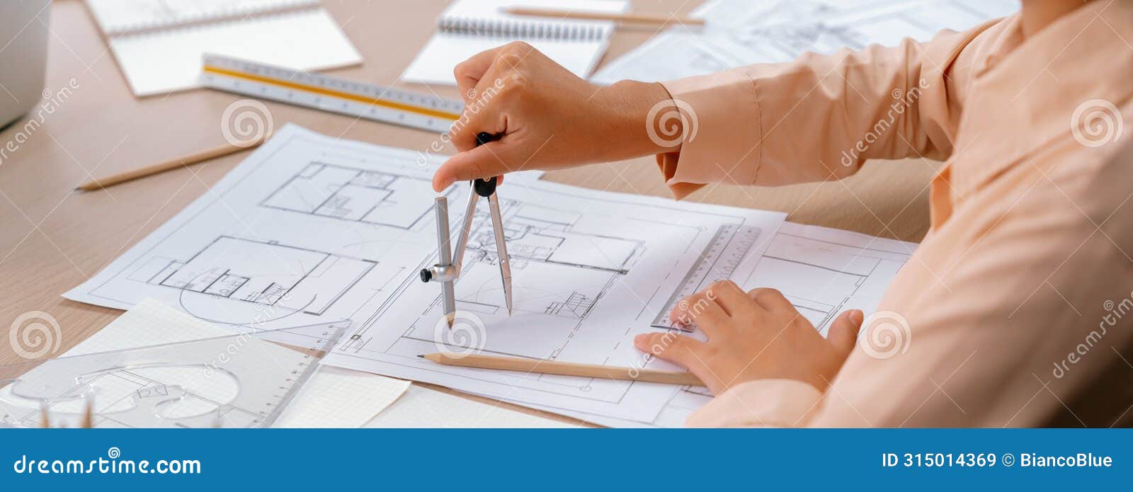 Professional Architect Drawing Blueprint by Using Divider. Closeup ...