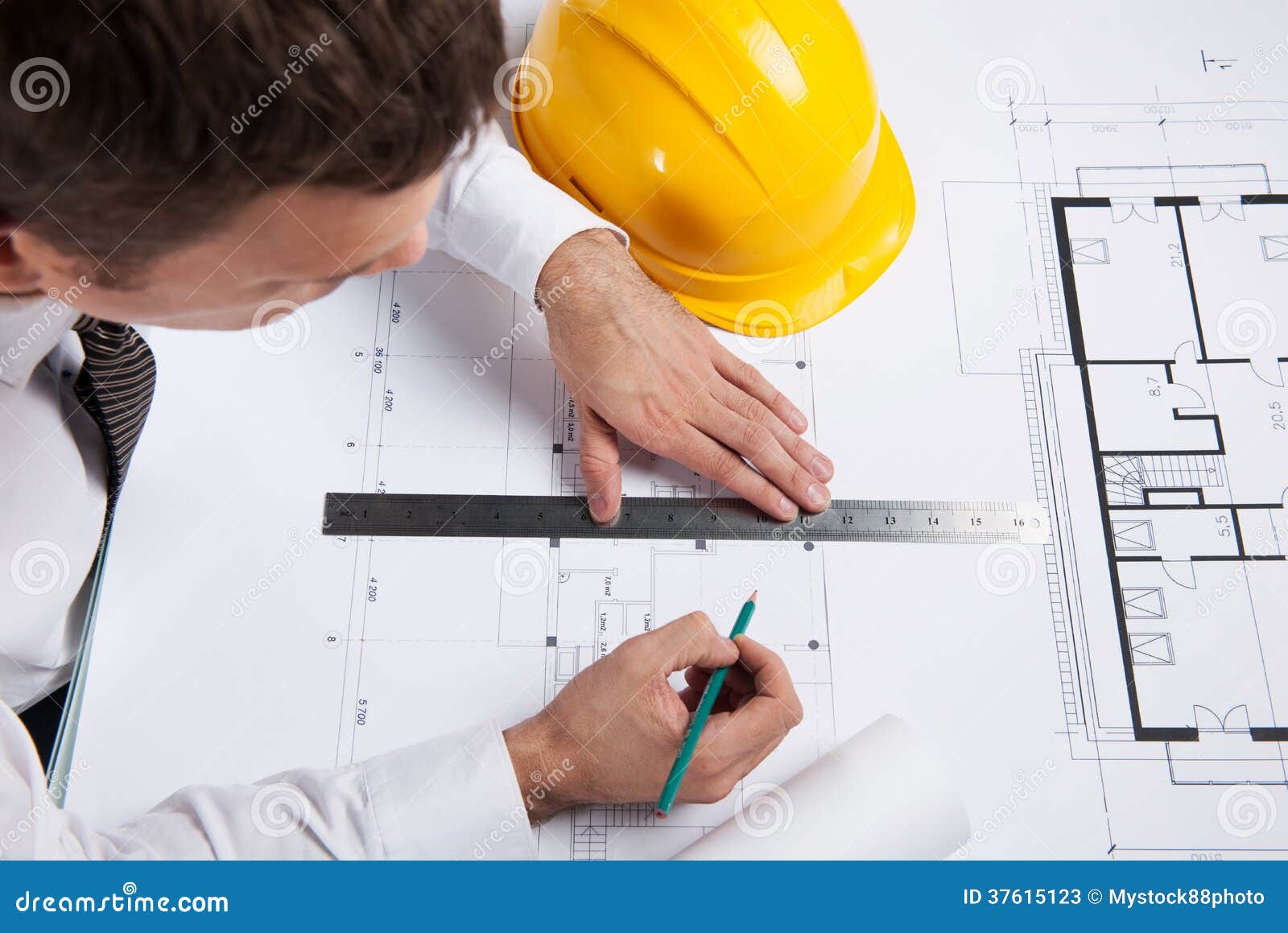 Professional Architect Drawing Construction Plan. Stock Image - Image ...