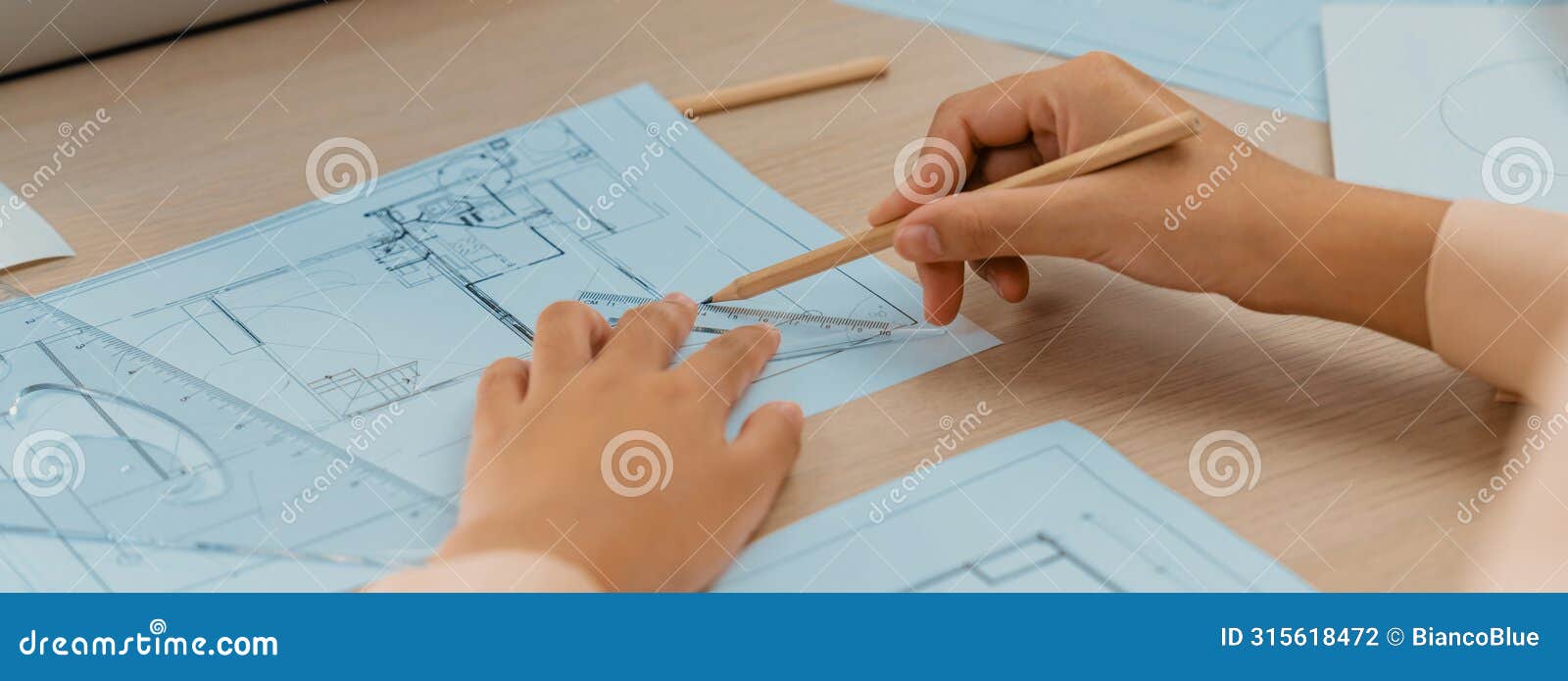 Professional Architect Hand Drawing a Blueprint on Table. Closeup ...