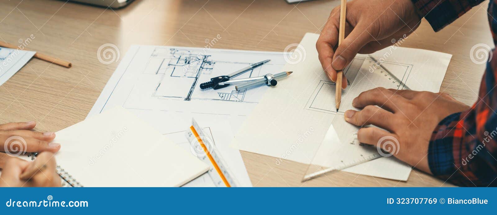 Professional Architect Hand Drawing a Blueprint on Table. Closeup ...