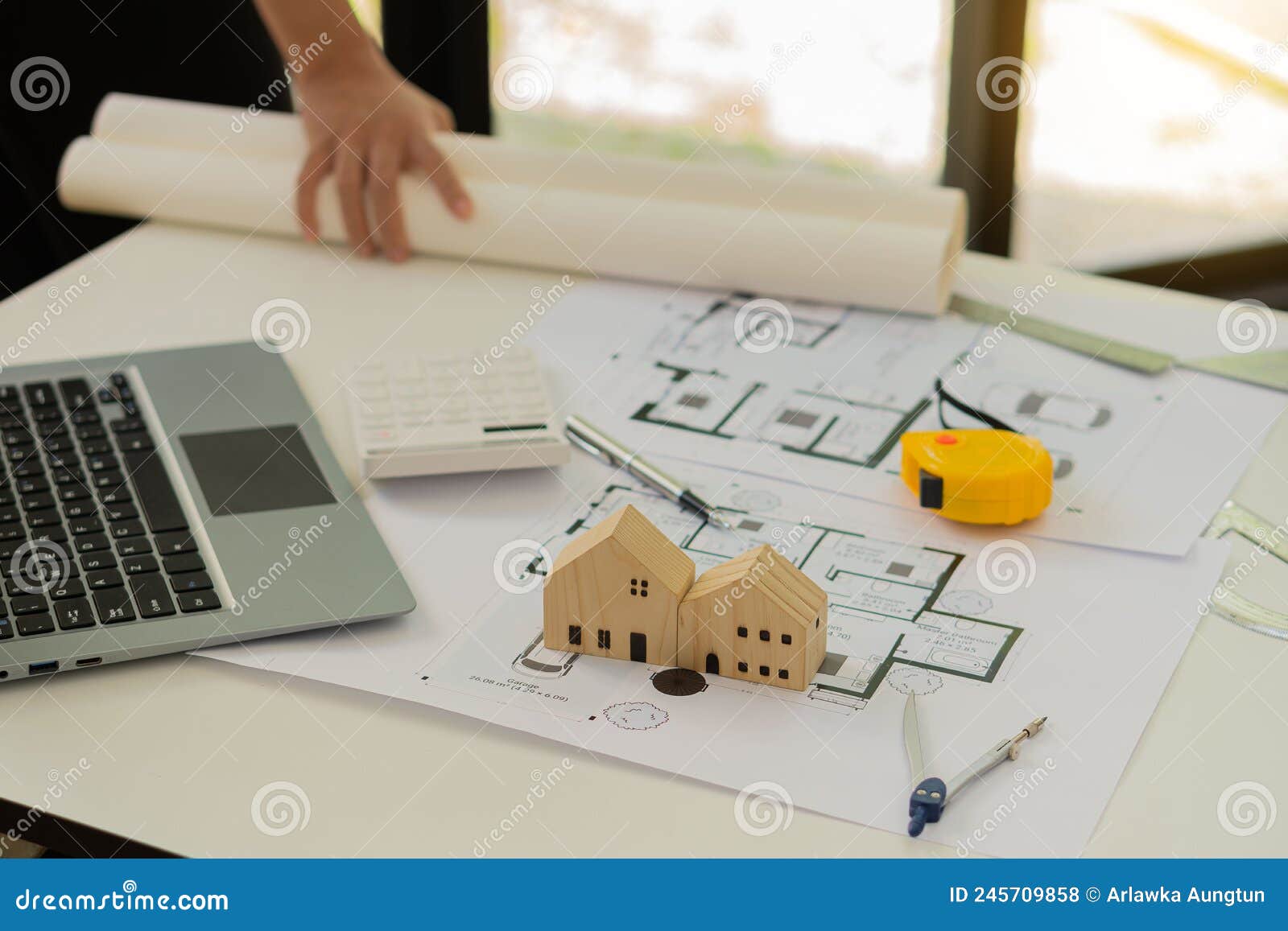 Professional Architect Working on Blueprints and Construction Plans ...