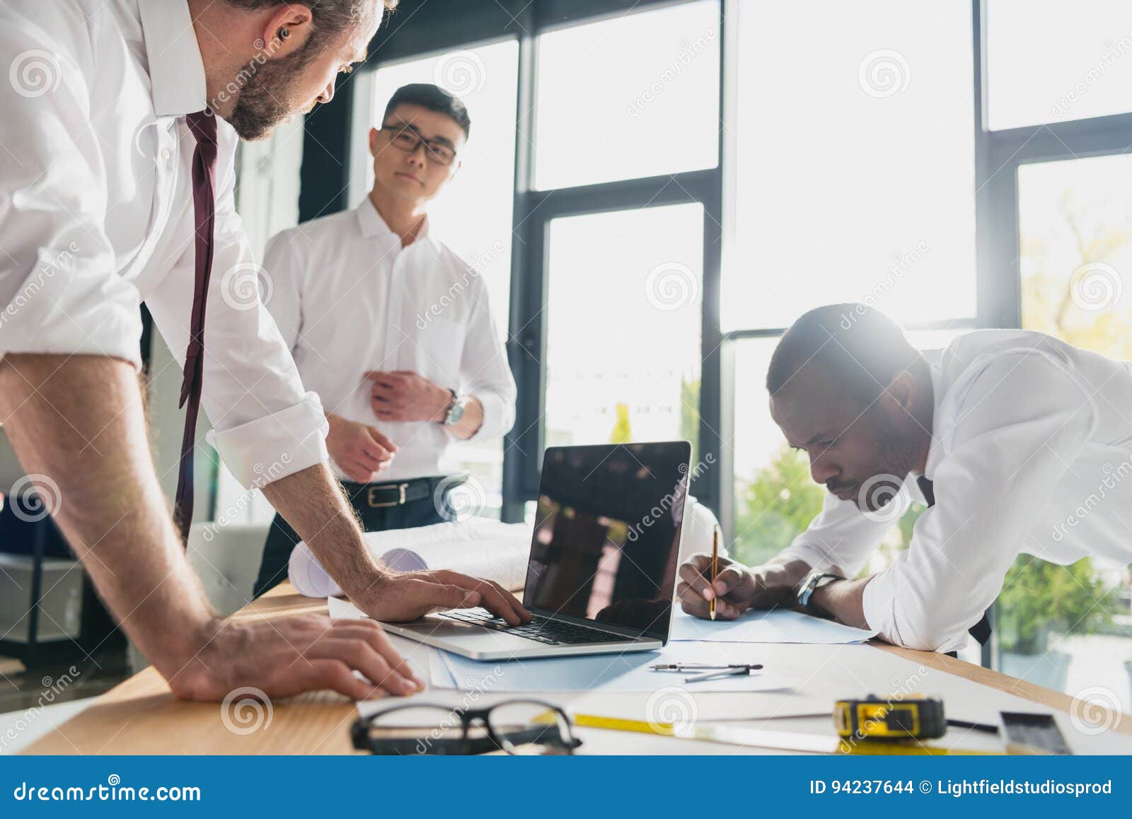 Professional Architects in Formal Wear Working at Modern Office Stock ...