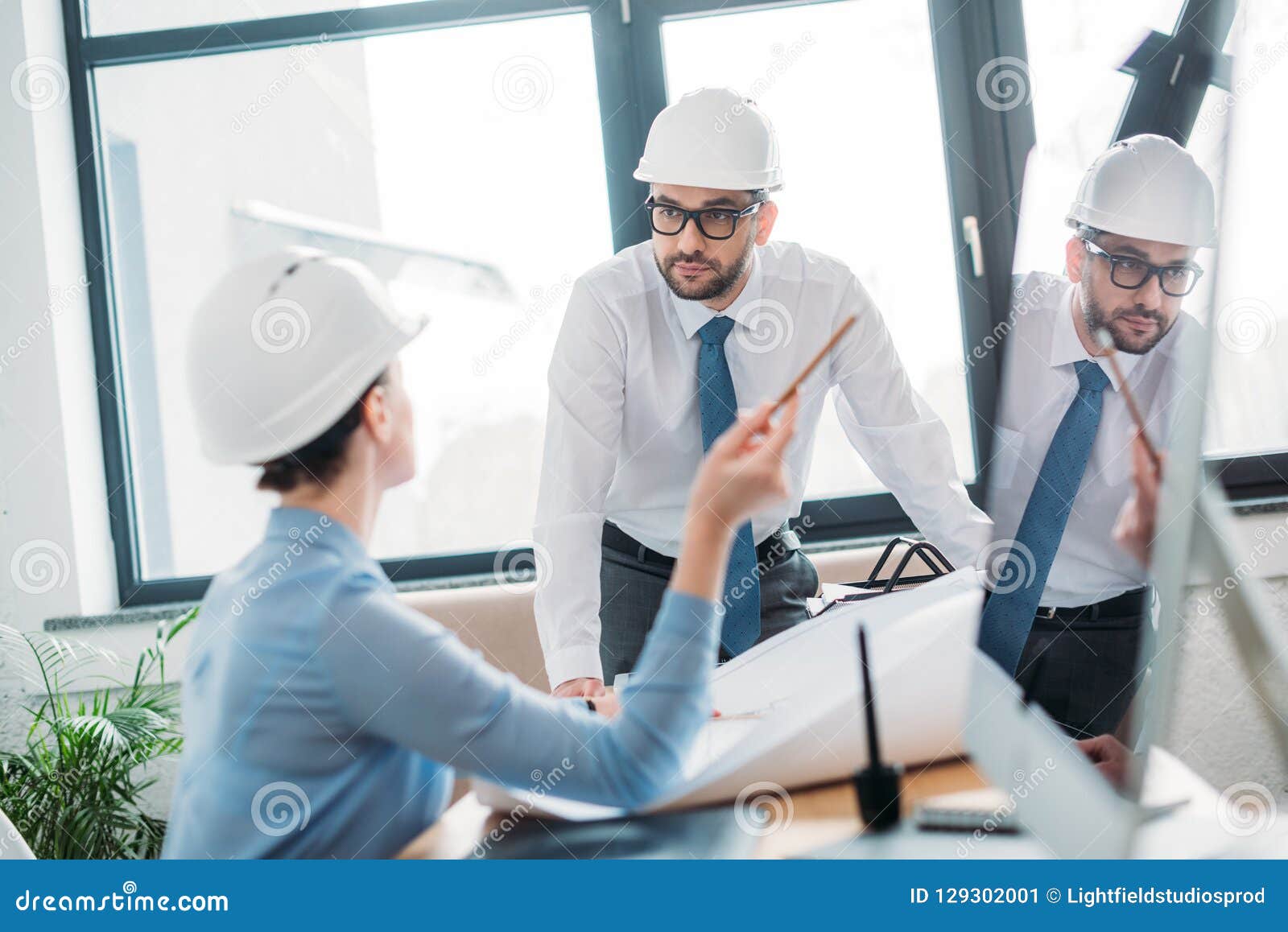 Professional Architects Working with Building Plan Stock Image - Image ...