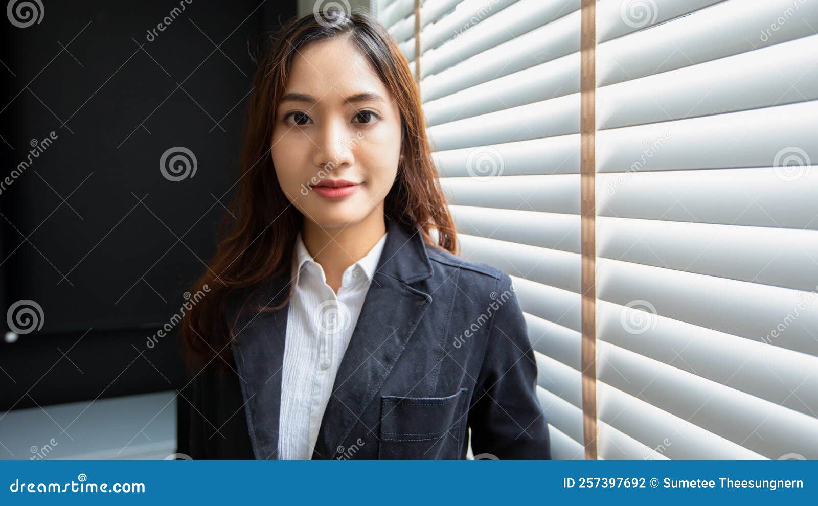 Professional Asian Business Woman Standing Confidently Smiling in the ... Professional Asian Business Woman Standing Confidently Smiling in the ...