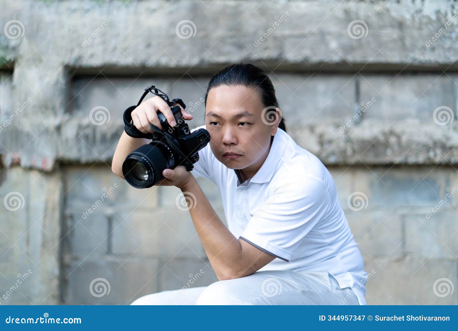 Professional Asian Chinese - Thai Camera Man Posture and Focus in ...