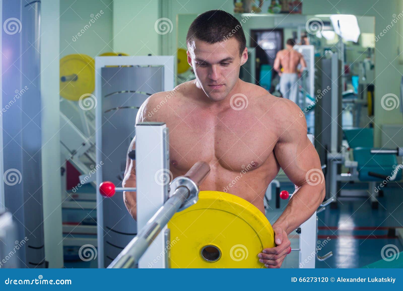 Professional Athlete Performs Exercises in the Gym Stock Photo - Image ...