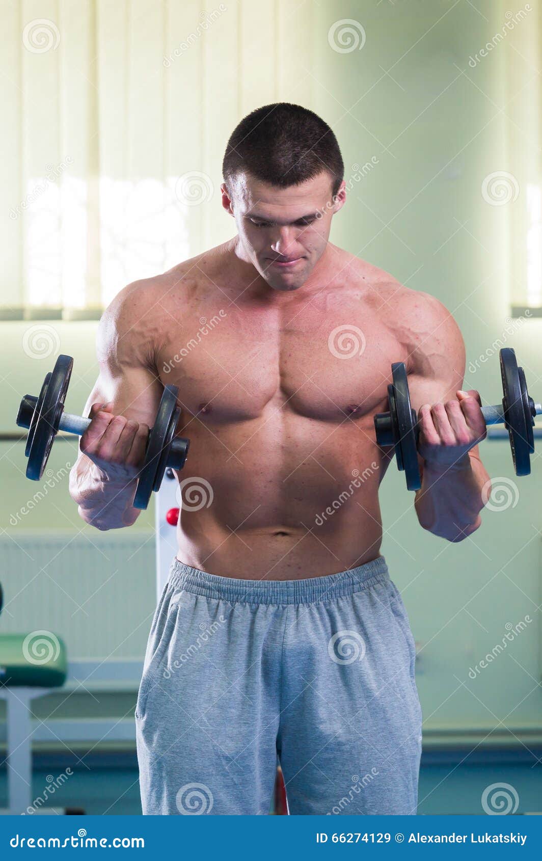Professional Athlete Performs Exercises in the Gym Stock Image - Image ...