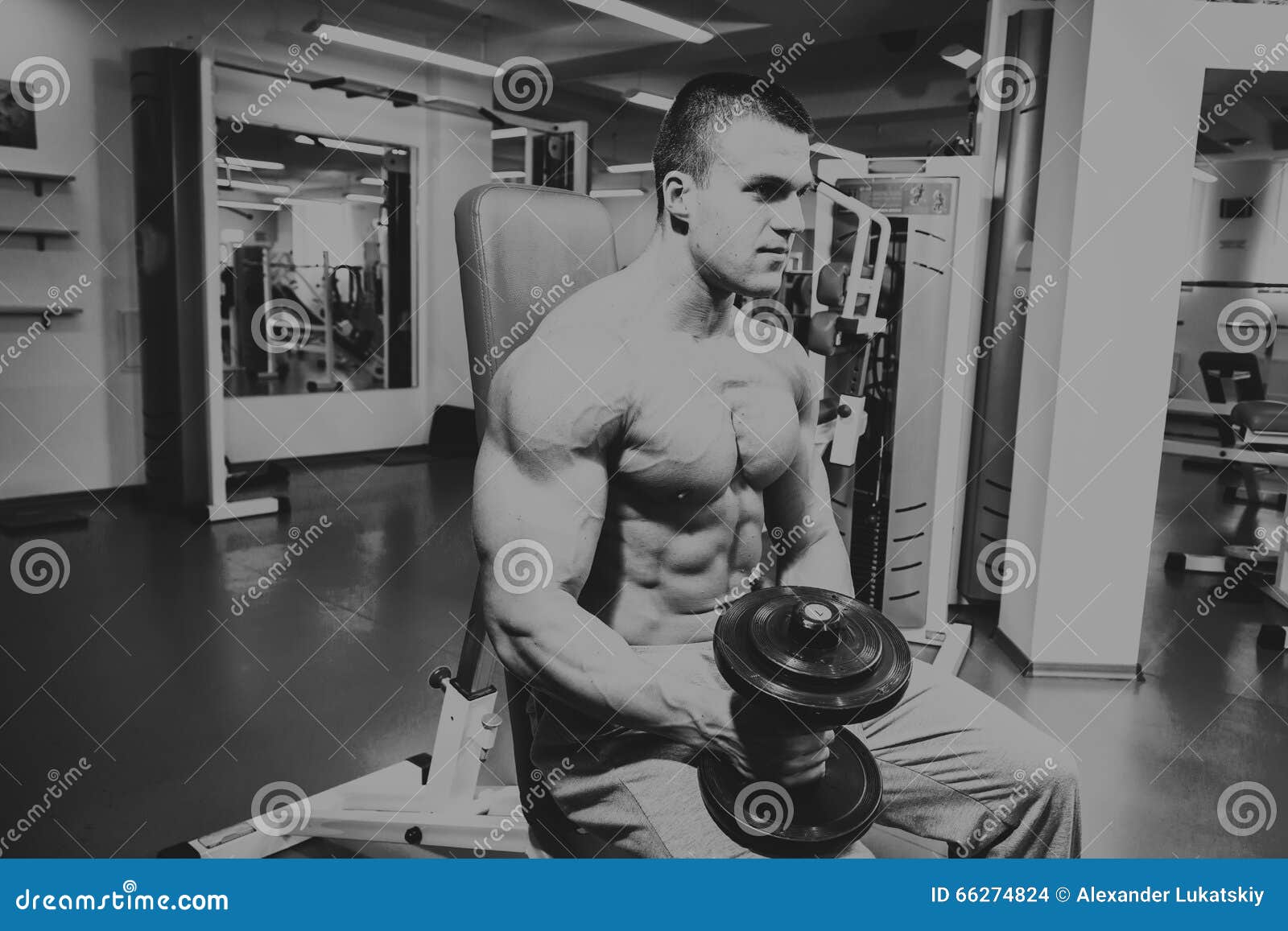 Professional Athlete Performs Exercises in the Gym Stock Photo - Image ...