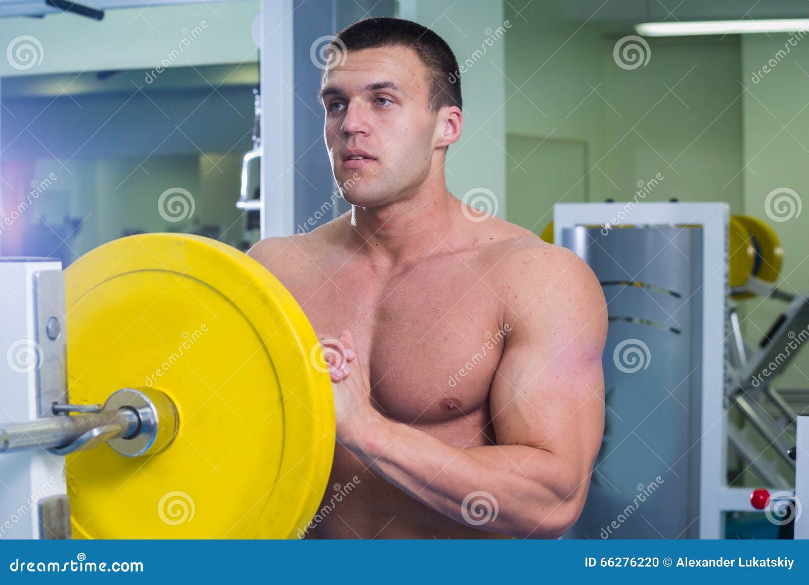 Professional Athlete Performs Exercises in the Gym Stock Photo - Image ...