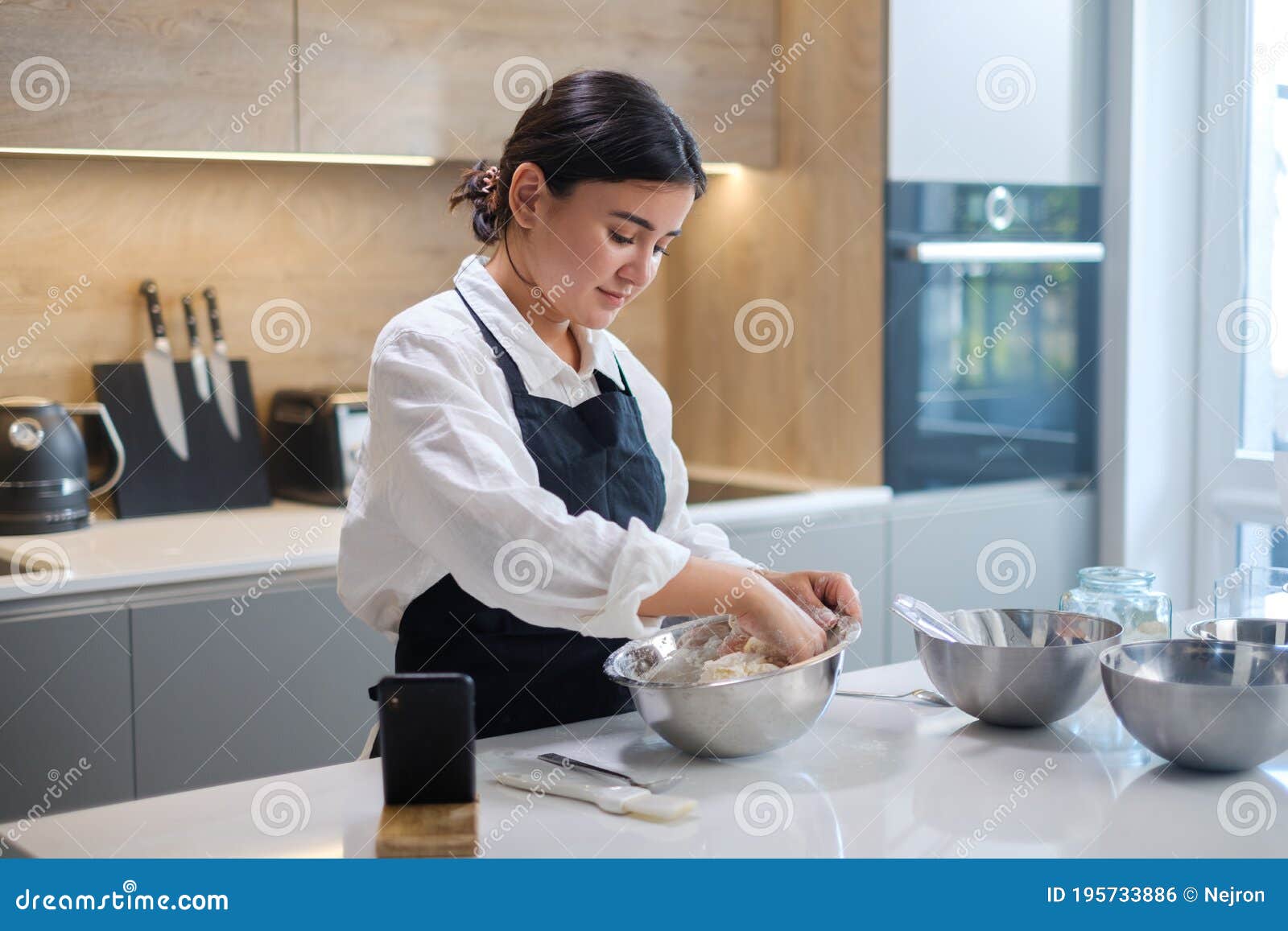 Professional Baker Holds In His Hands Freshly Baked Hot Bread On A ...