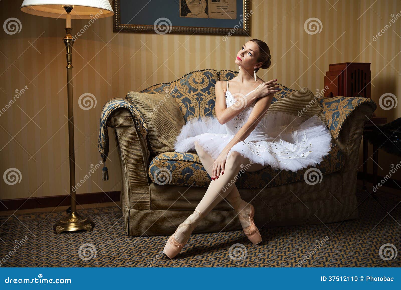 Professional Ballet Dancer Sitting on Sofa Stock Photo - Image of ...