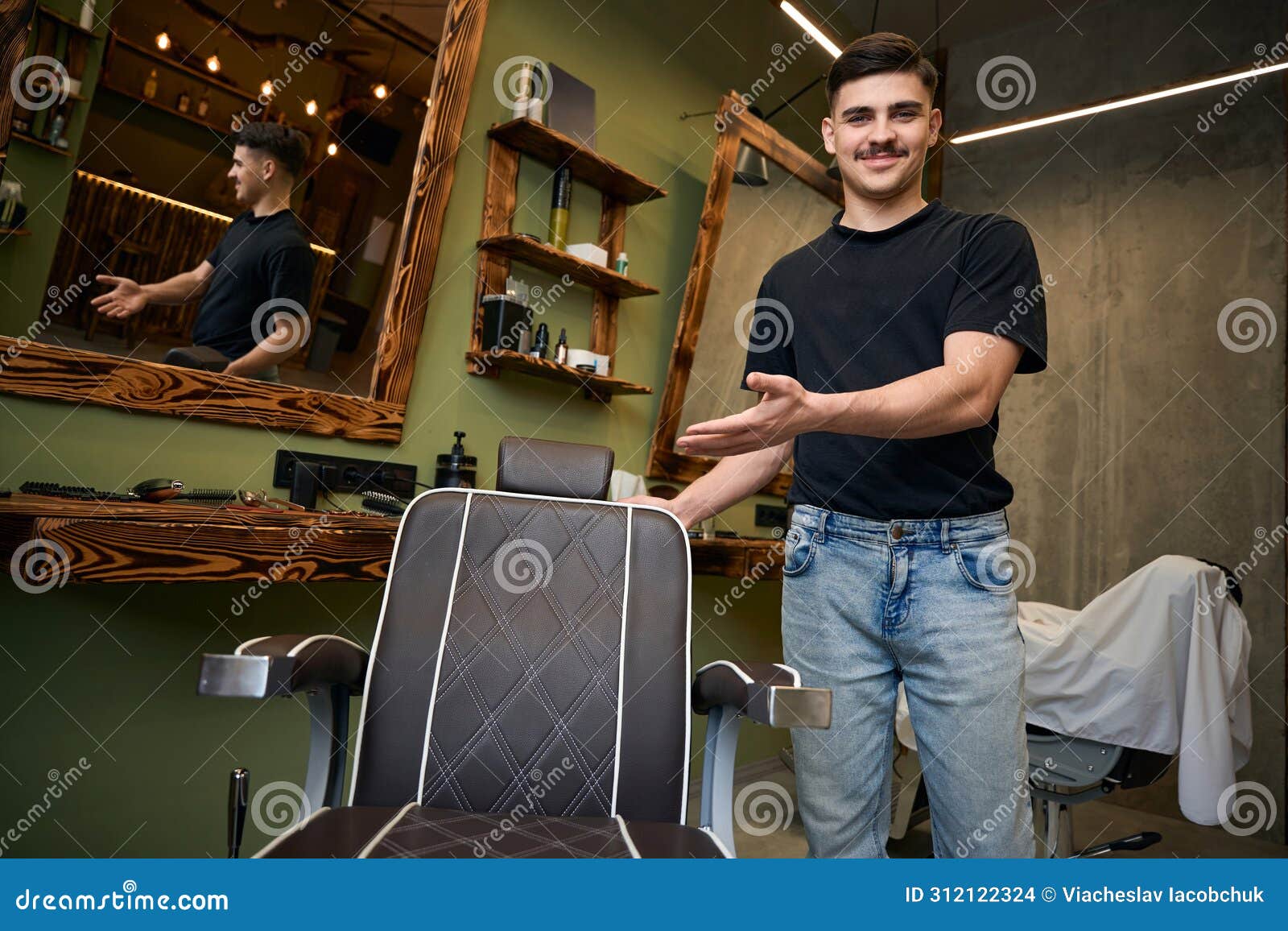 Professional Barber Standing at His Workplace Inviting Customers Stock ...