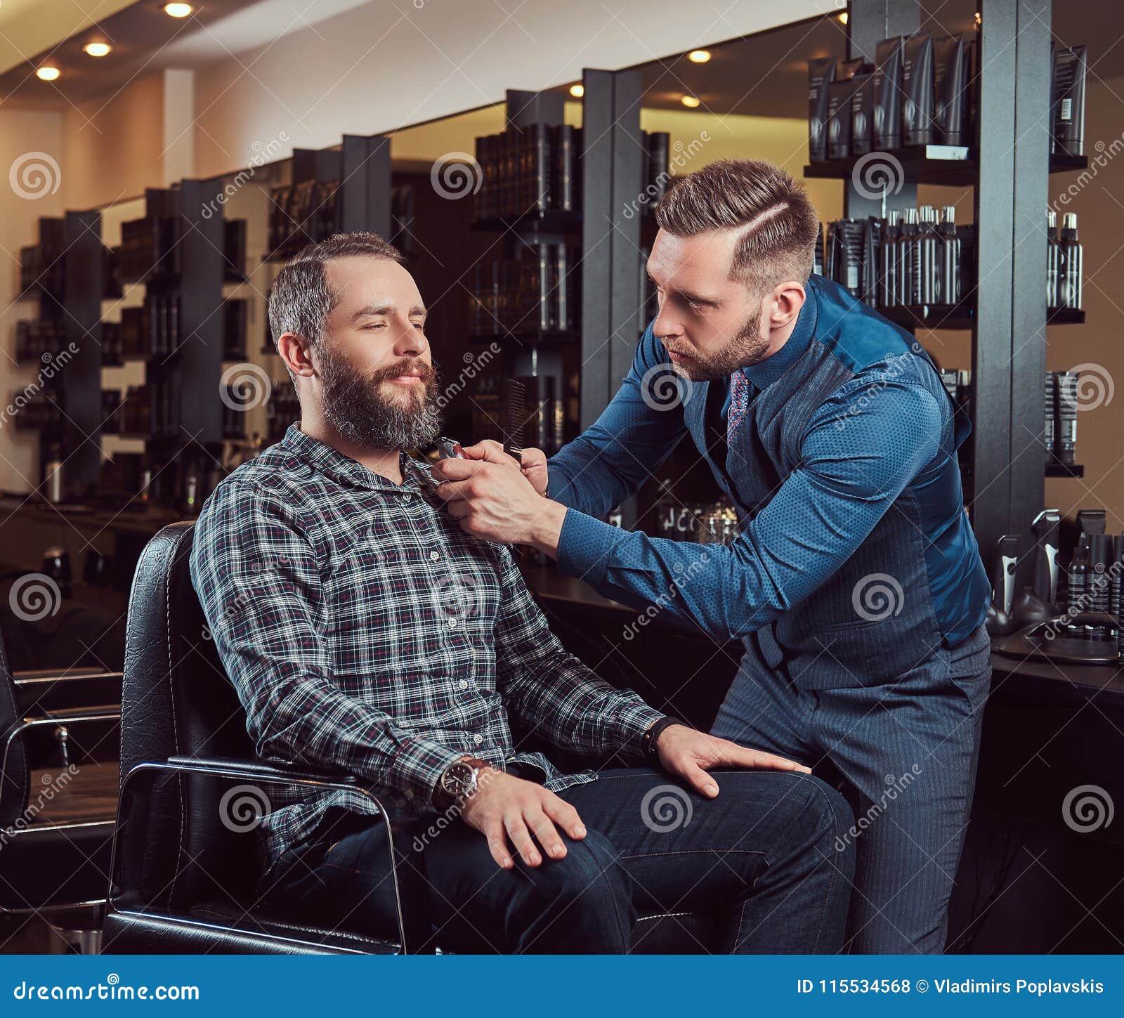 Professional Barber Working with a Client in a Hairdressing Salon ...