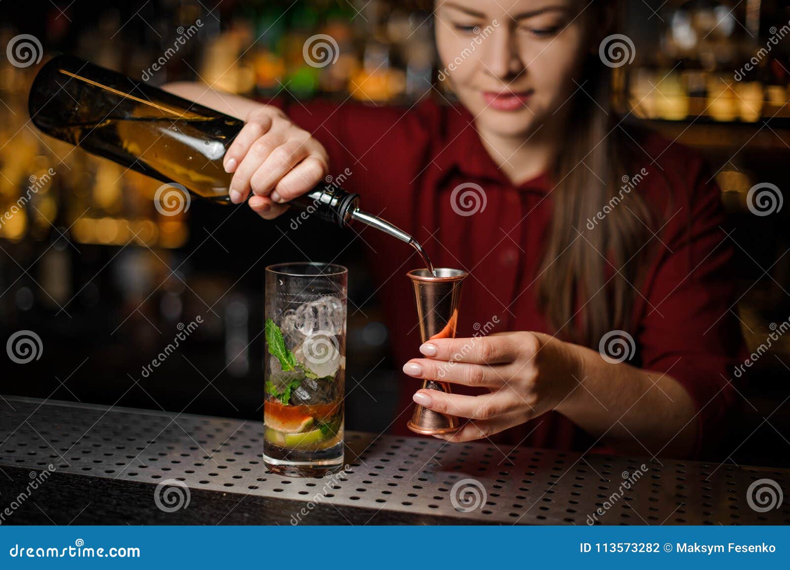 Professional Barmaid Prepares a Mojito, Adding Dark Rum Stock Photo ...