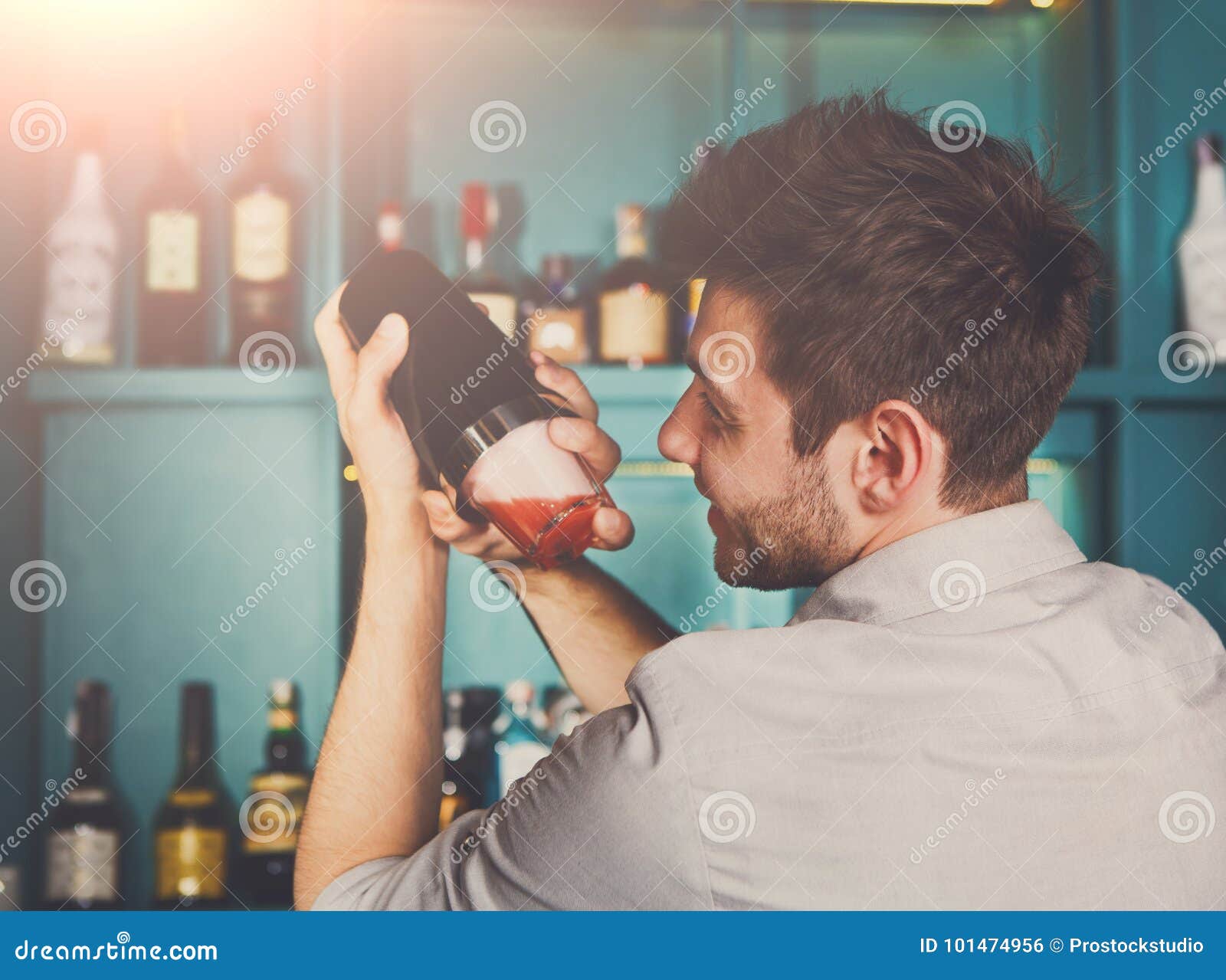 Bartender Mixing Alcoholic Cocktail in Shaker Stock Photo - Image of ...
