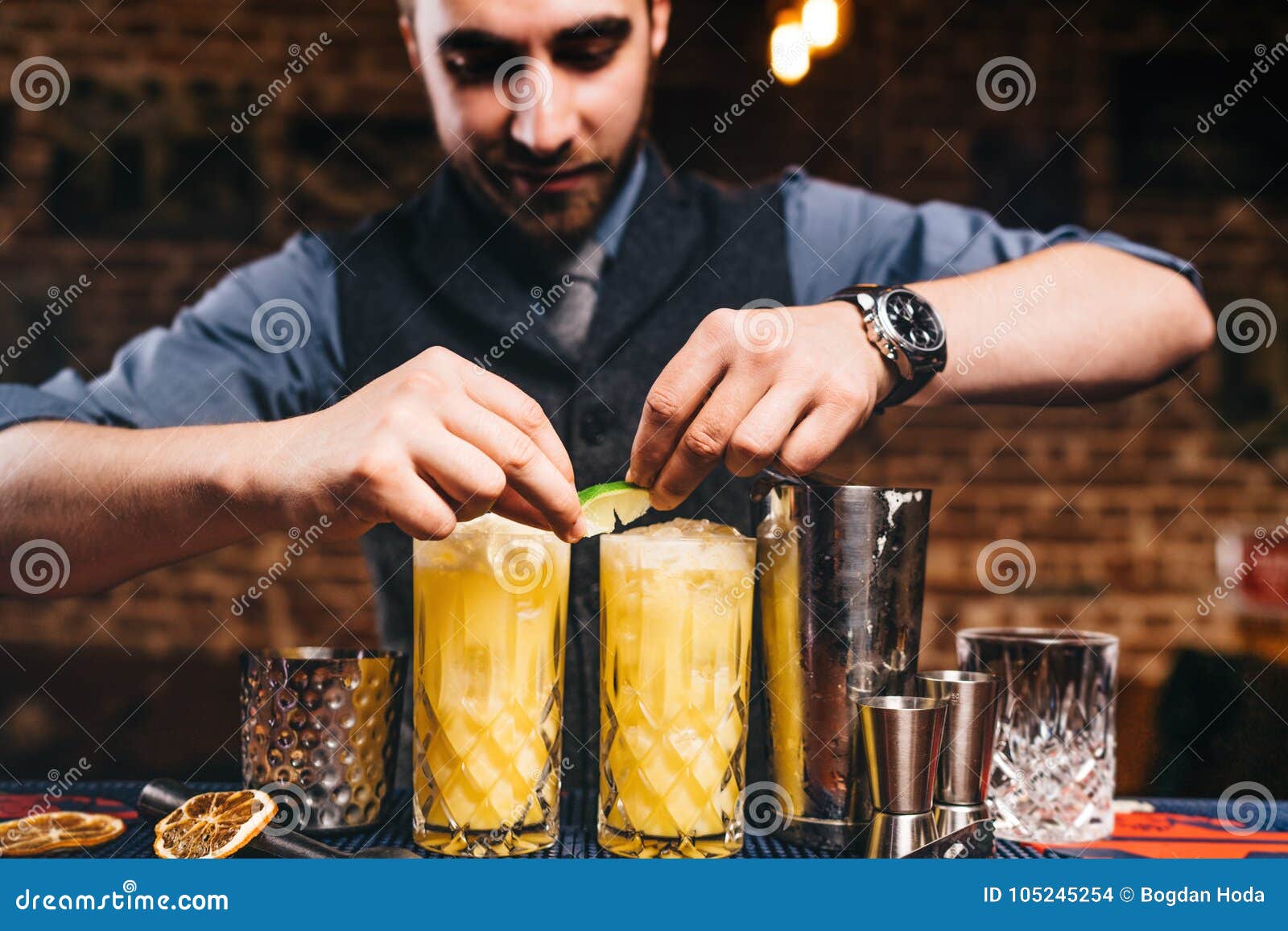 Professional Barman Garnishing with Lime Cocktails Stock Photo - Image ...