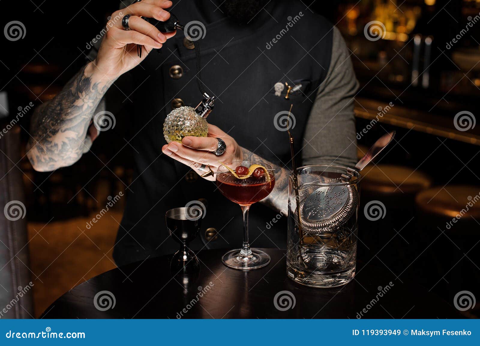 Professional Bartender Spraying on the Delicious Cocktail with a ...