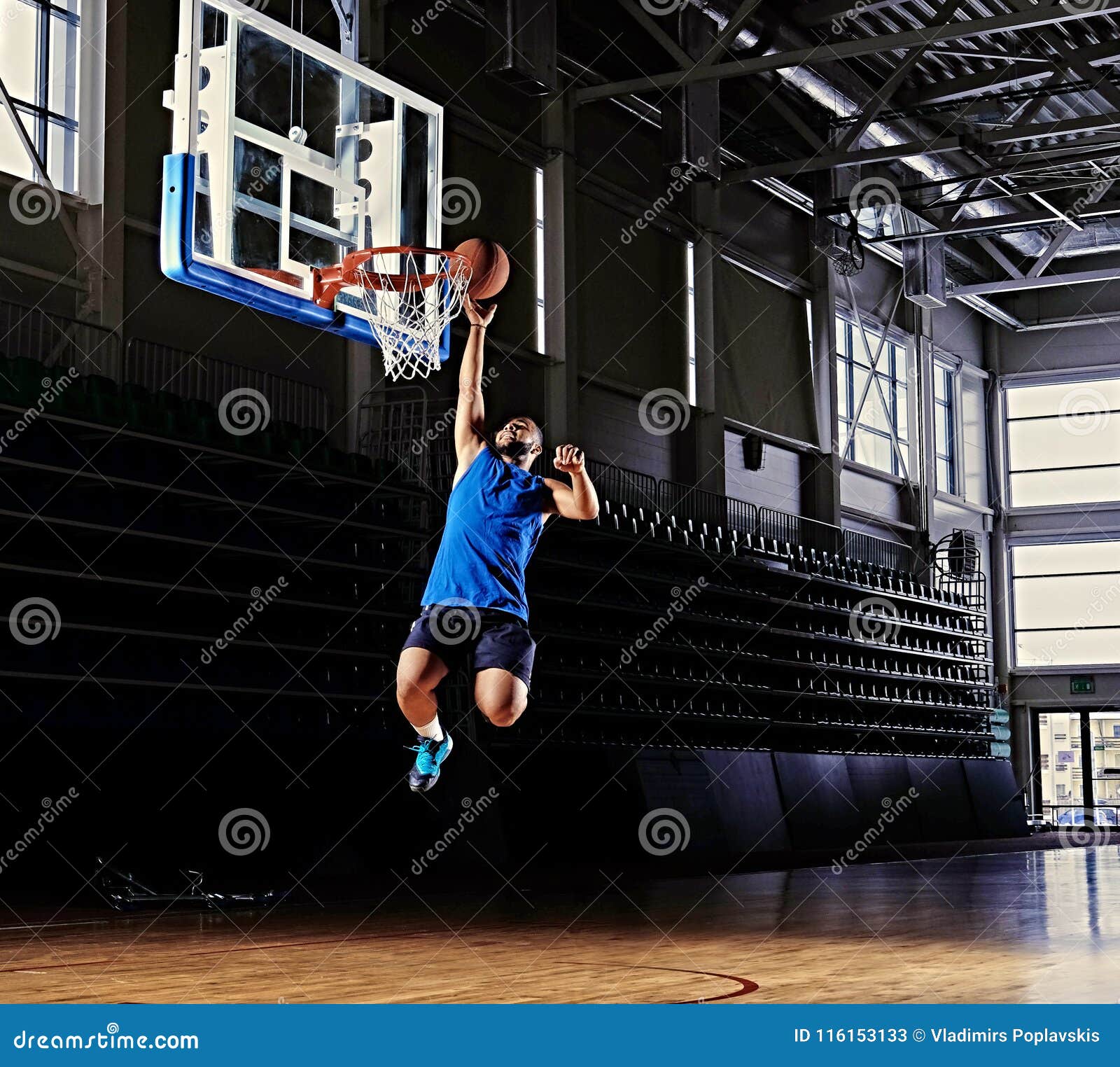 Professional Basketball Player in Action on a Basketball Field. Stock ...
