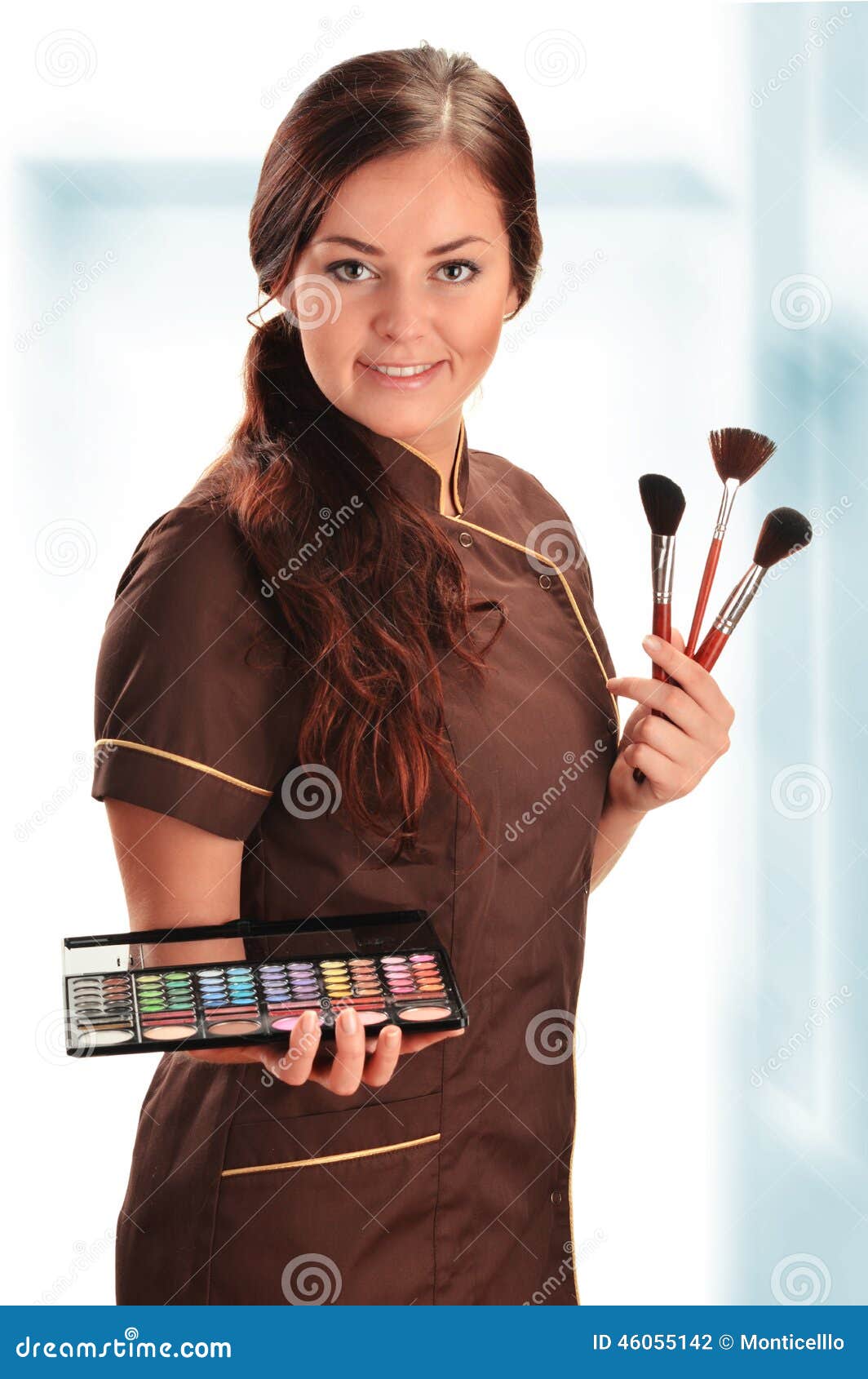 Professional Beautician in Uniform Holding Brushes Stock Photo - Image ...