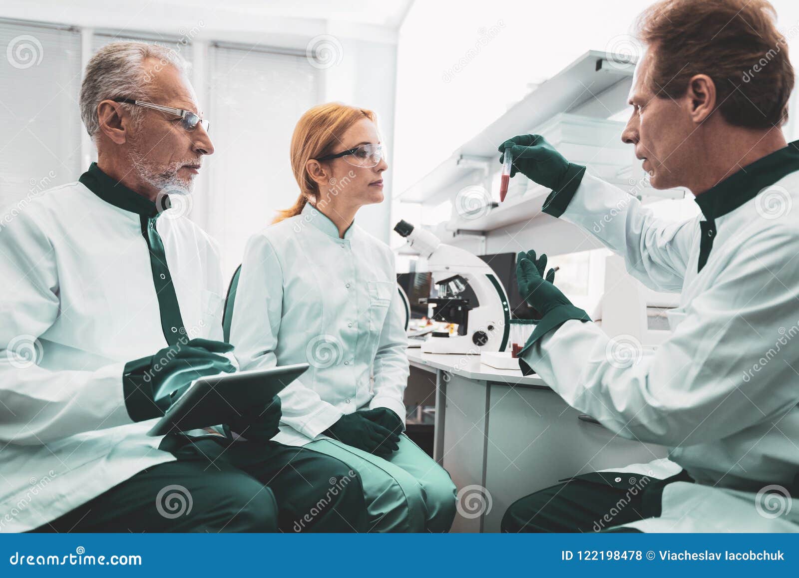 Professional Bioengineer Teaching His Partners Stock Photo - Image of ...