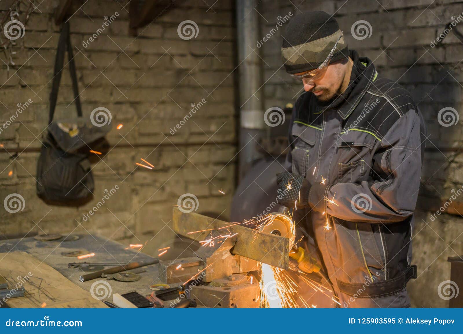 Blacksmith Sawing Metal with Hand Circular Saw Stock Image - Image of ...