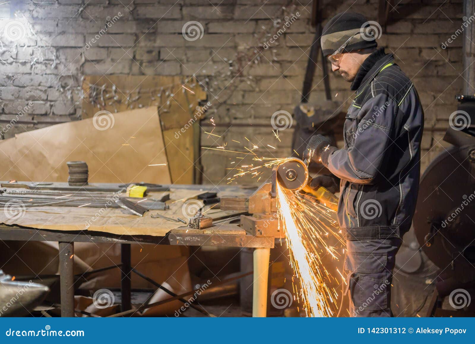Blacksmith Sawing Metal with Hand Circular Saw Stock Photo - Image of ...