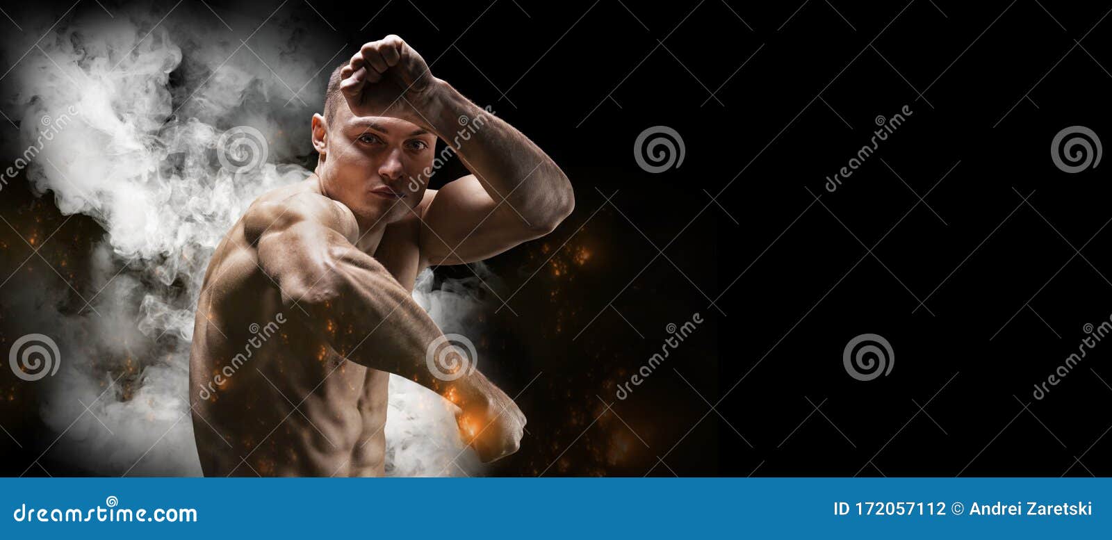 Professional Boxer Posing in the Studio. he Stands in Front of the ...