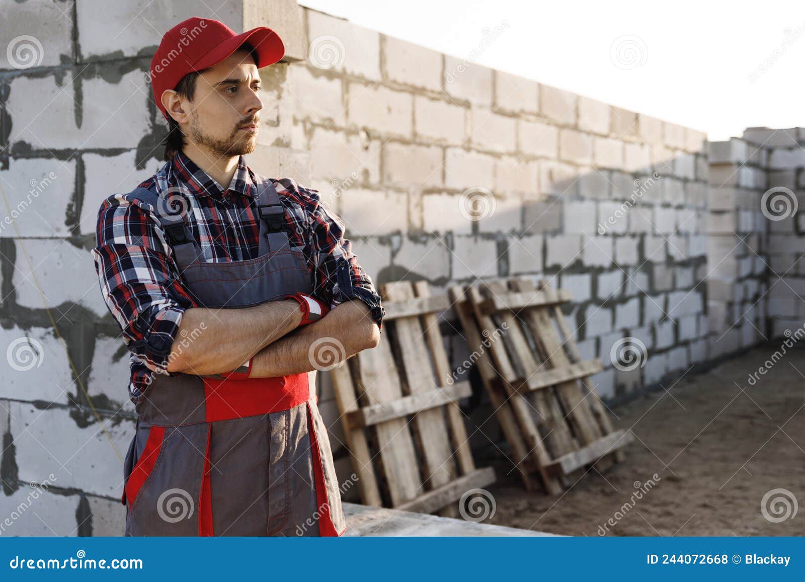 Professional Bricklayer Man at the Construction Site Stock Photo ...