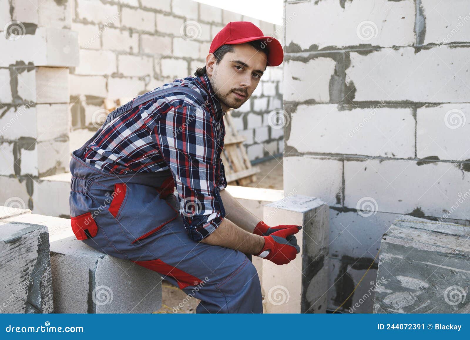 Professional Bricklayer Man at the Construction Site Stock Image ...