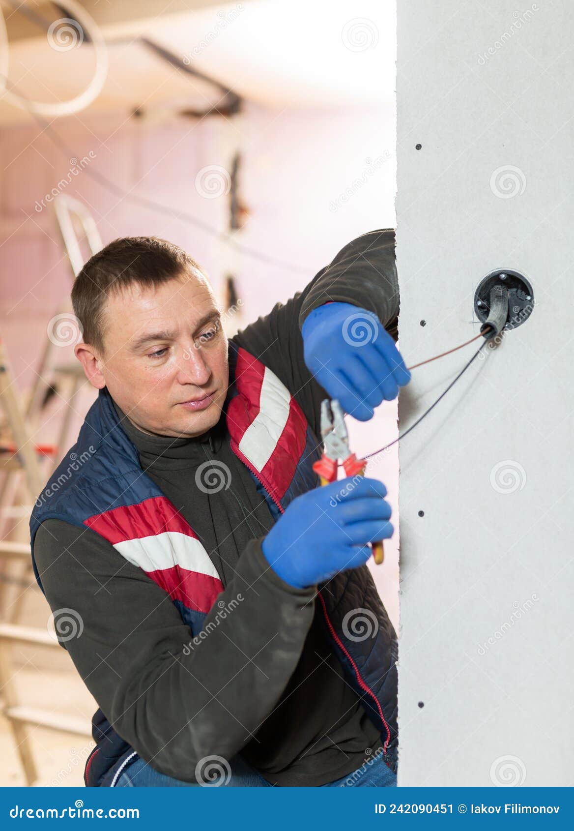 Professional Builder Engaged in Electrical Installation Work at Indoors ...