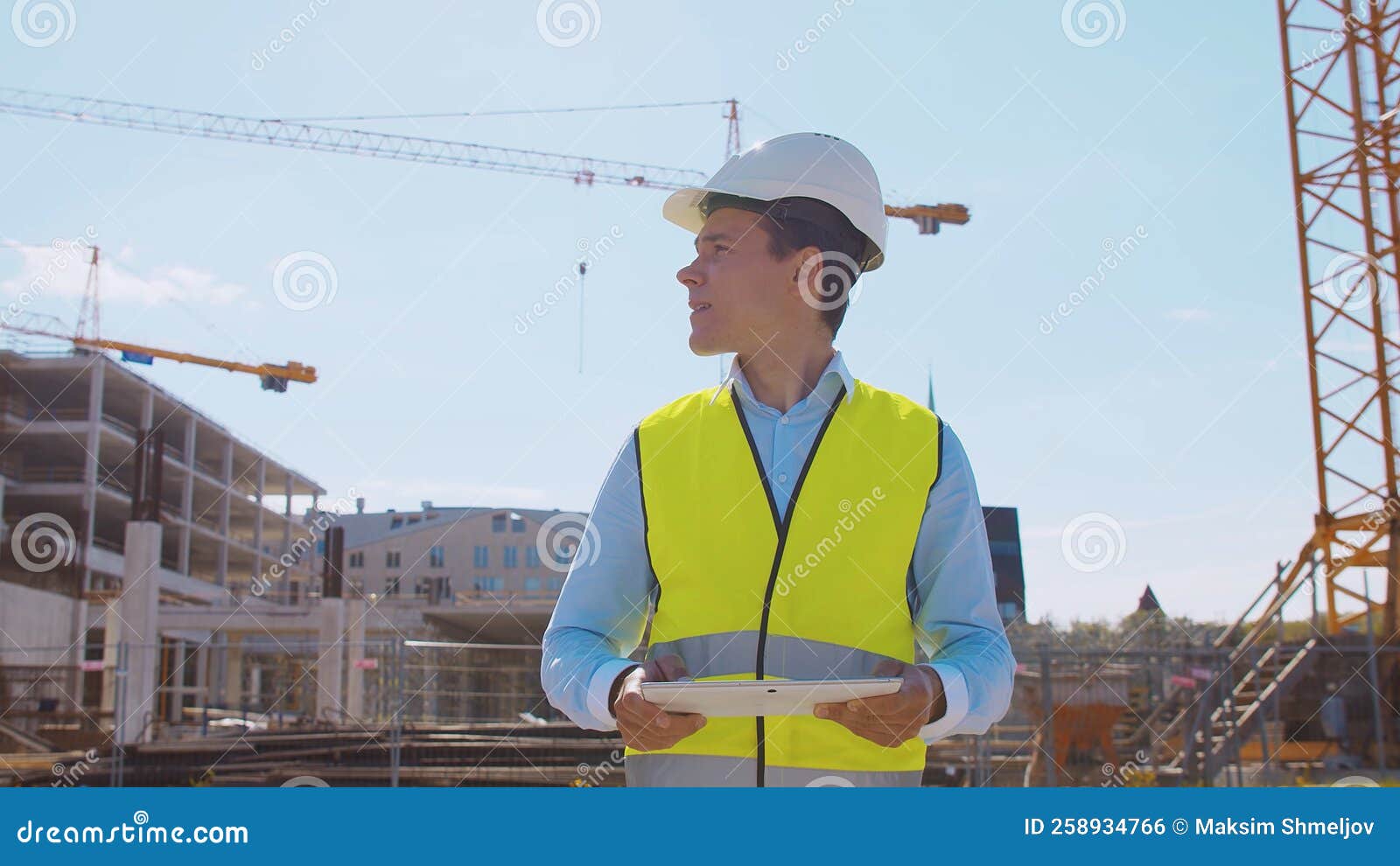 Professional Builder Standing in Front of Construction Site. Foreman in ...