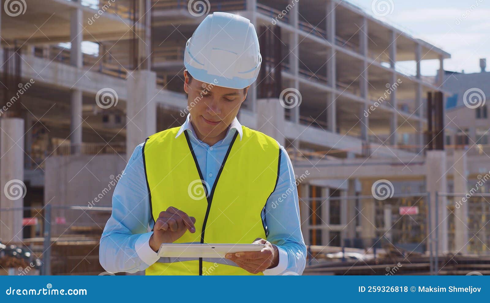 Professional Builder Standing in Front of Construction Site. Foreman in ...