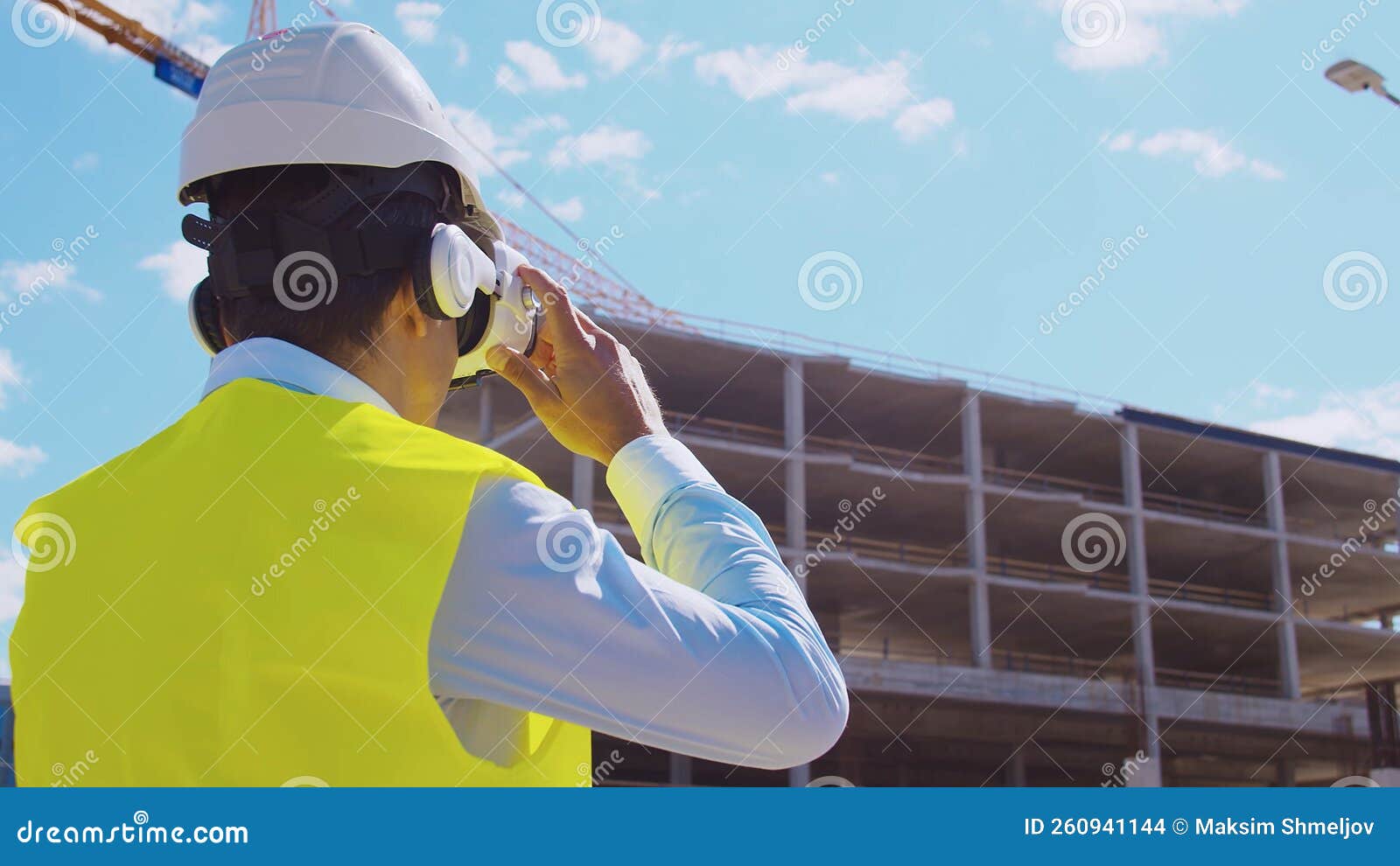 Professional Builder in VR Helmet Standing in Front of Construction ...